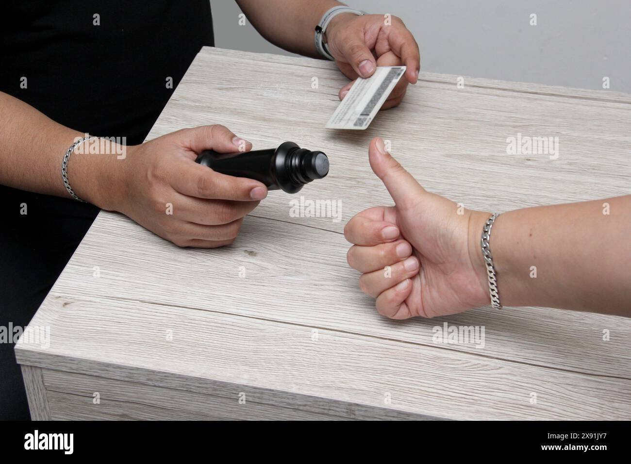 Indelible electoral ink that marks the thumb of the hand of a voter in ...