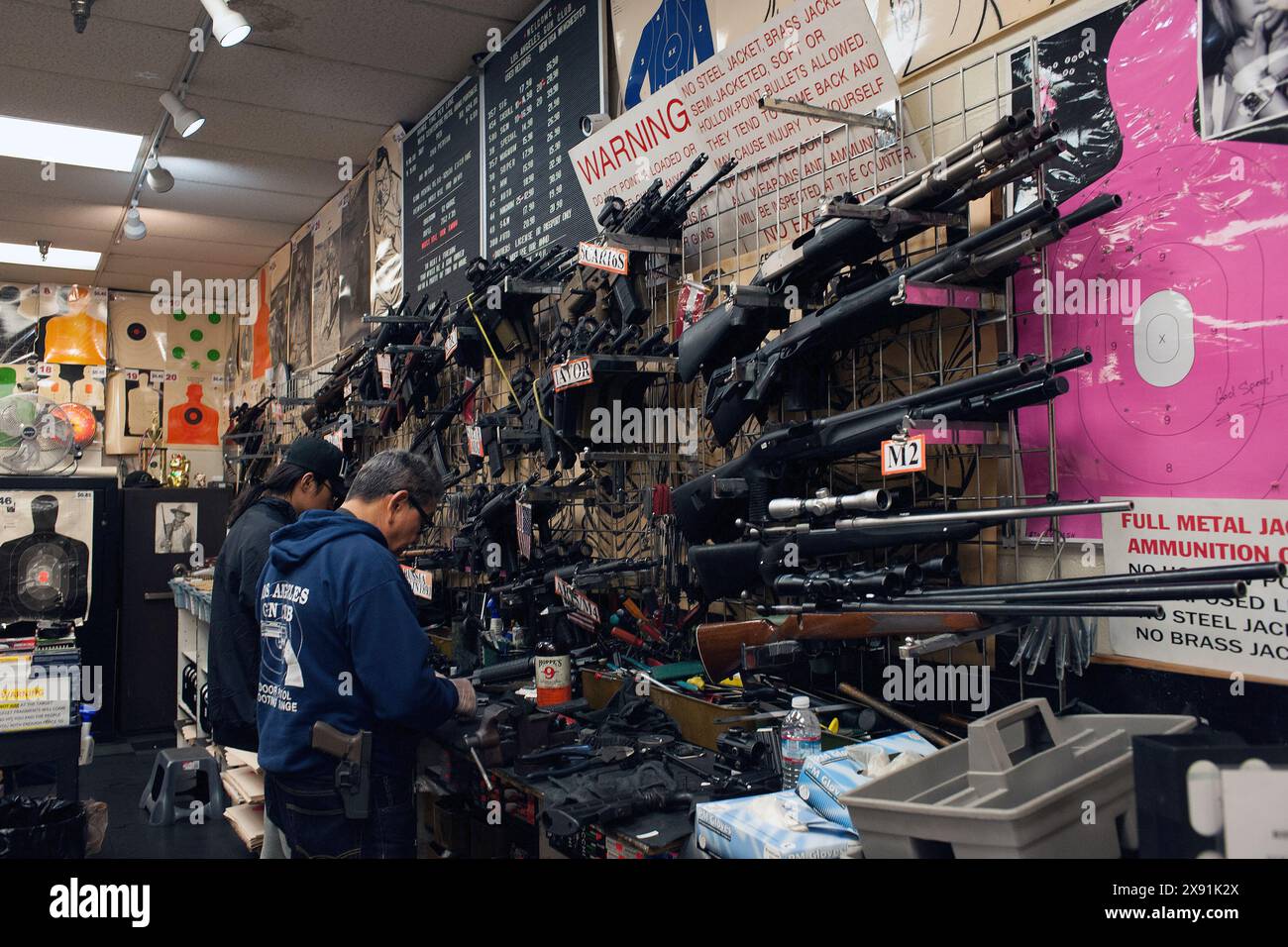 Los Angeles gun club downtown Los Angeles, several hundred hand guns ...