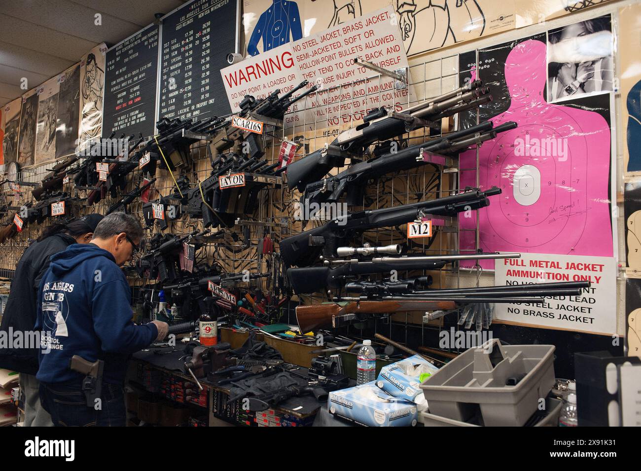 Los Angeles gun club downtown Los Angeles, several hundred hand guns ...