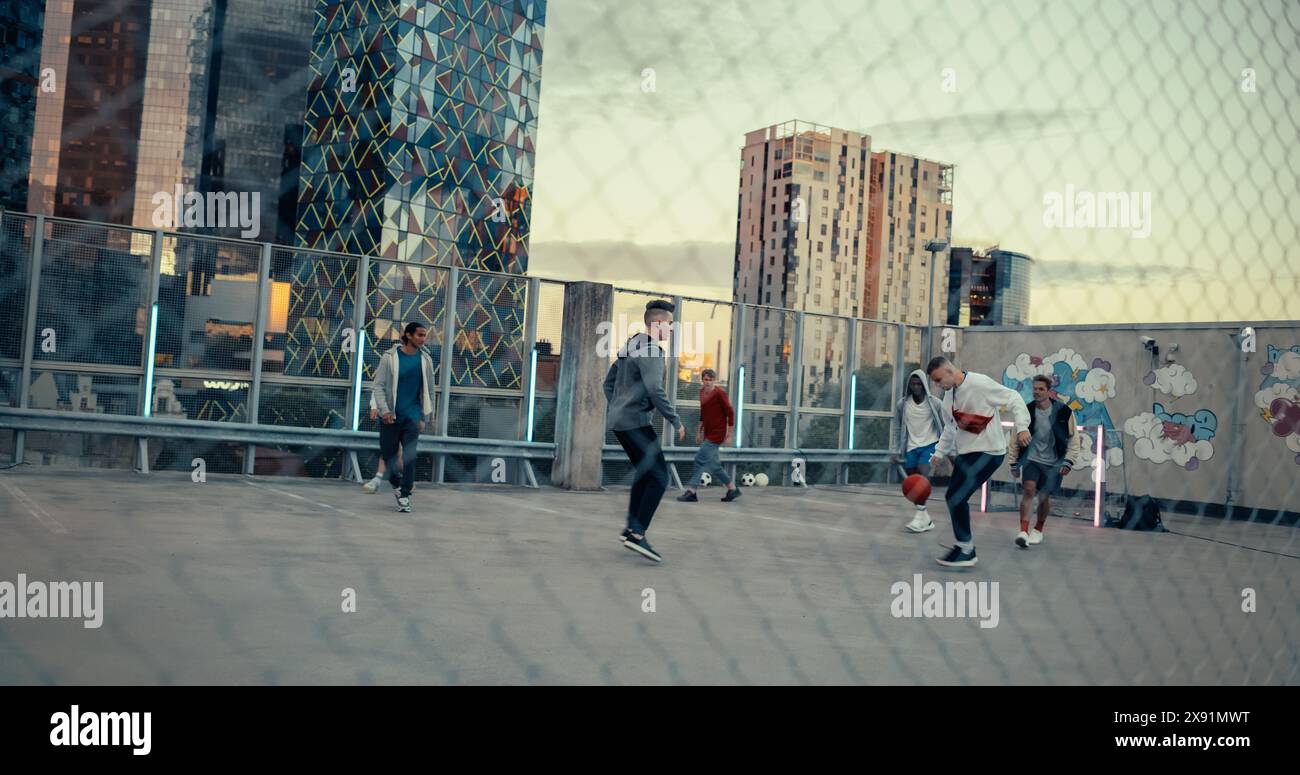 Young Stylish People Playing Soccer on a Rooftop Around Modern City ...