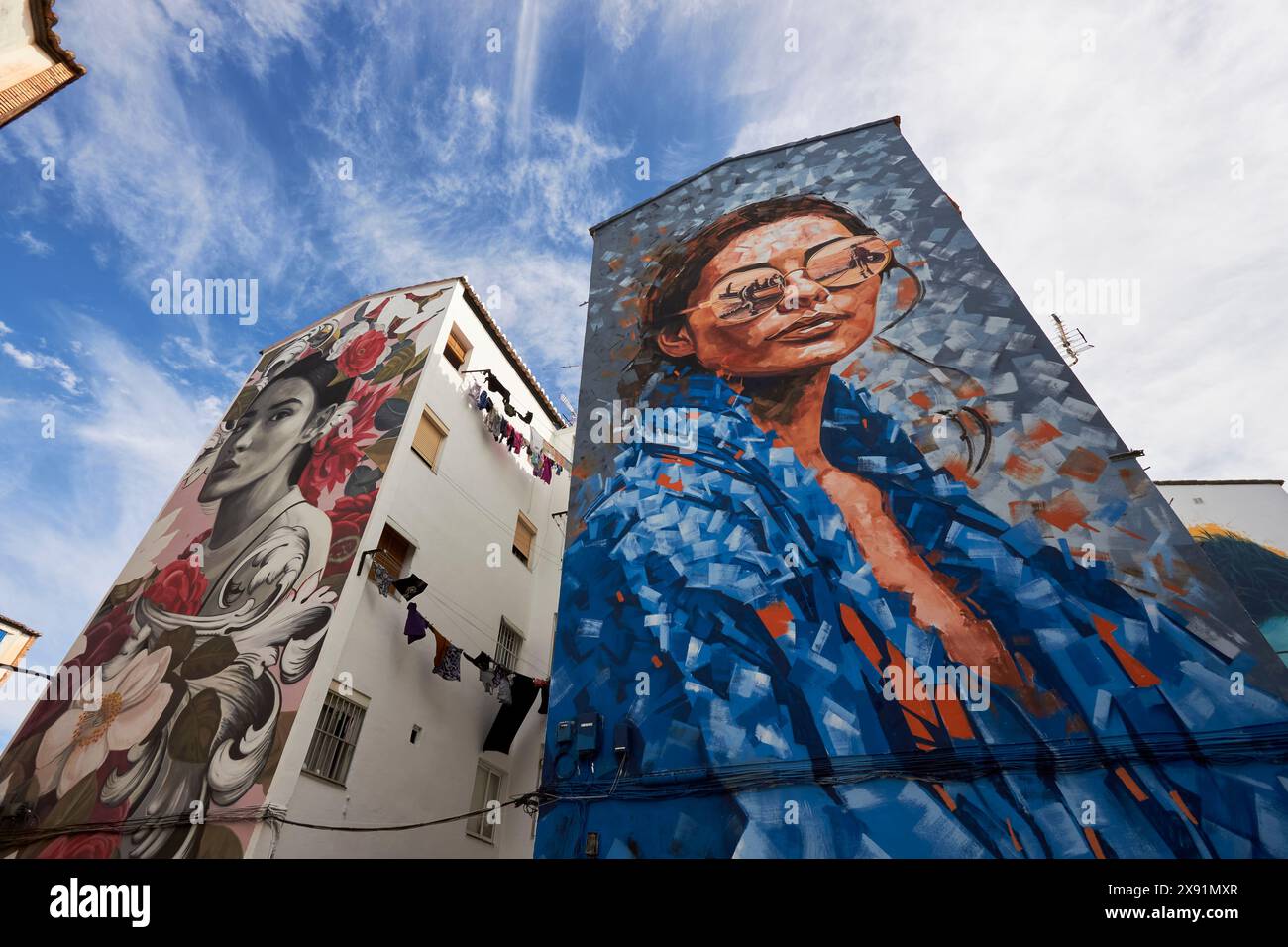 Mural paintings on the facades of residential poor urban area in ...