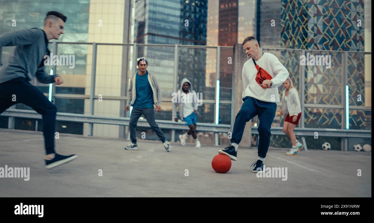 Multiethnic Diverse Group of Friends Playing Soccer Outside on Rooftop ...