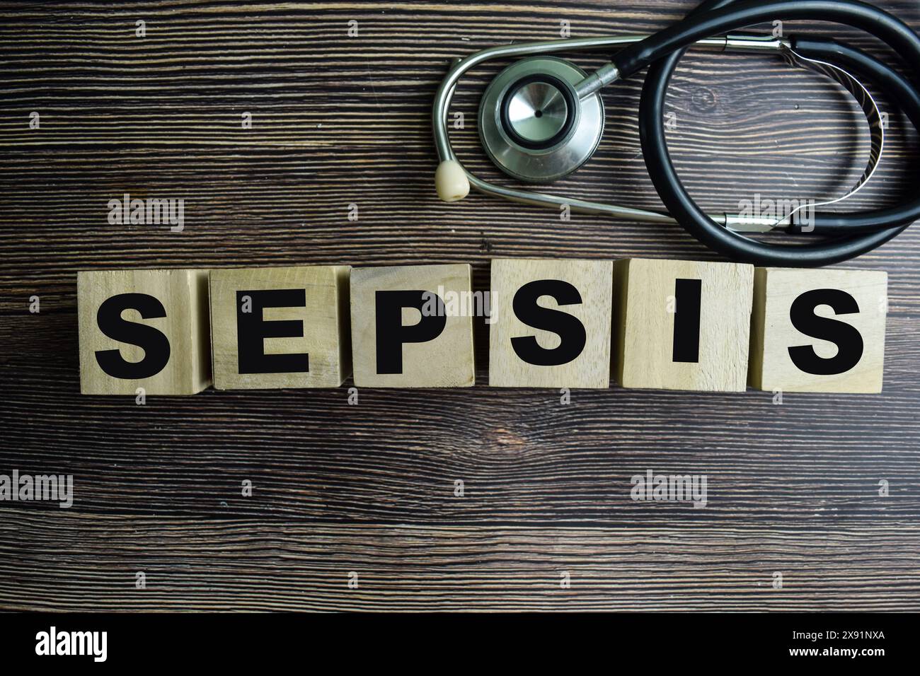 Concept of The wooden Cubes with the word Sepsis on wooden background ...