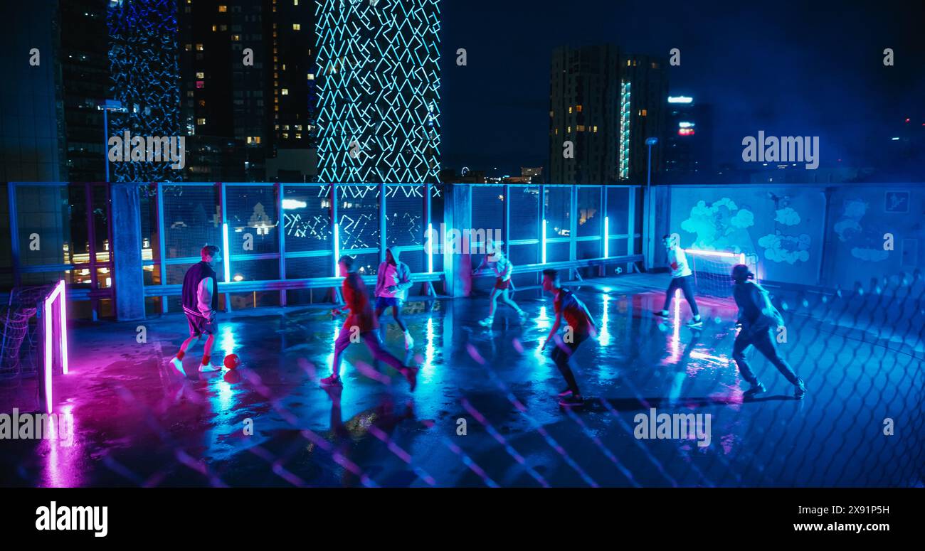 Group of Diverse People Playing Soccer at a Stylish Rooftop Spot with ...