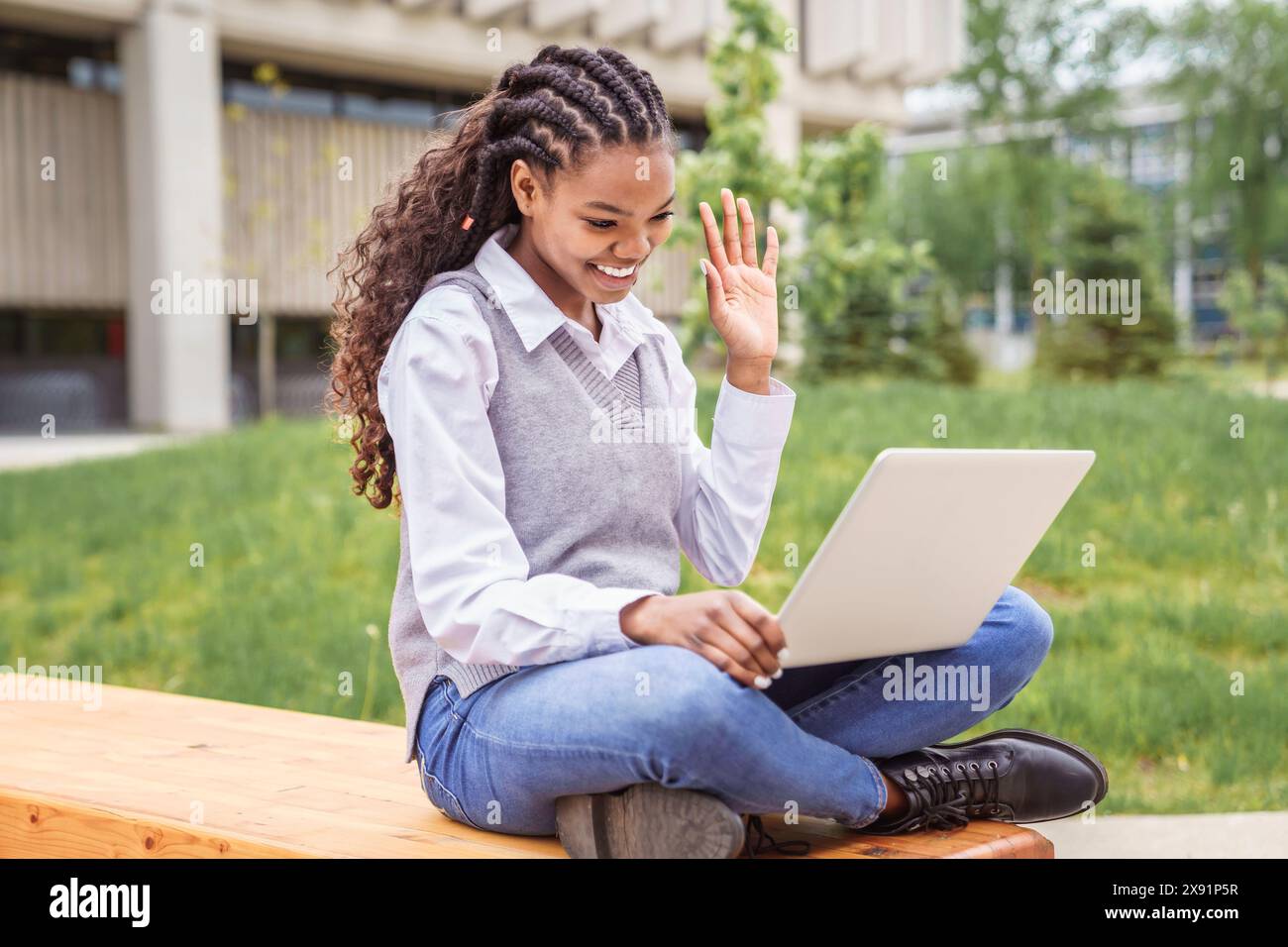 cute black teenager university student on campus with backpack Stock ...