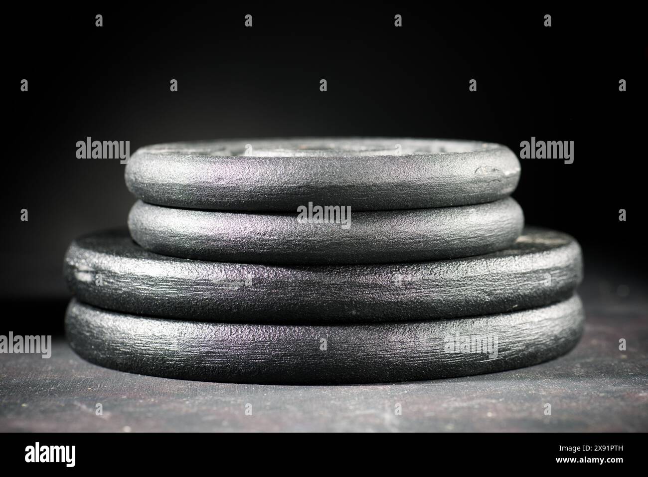 Close up of metal dumbbells group to strengthen muscles Stock Photo - Alamy