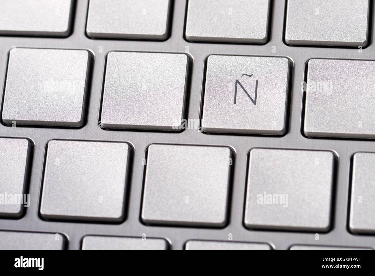 Close up of special letter n of the Spanish alphabet on a grey keyboard ...