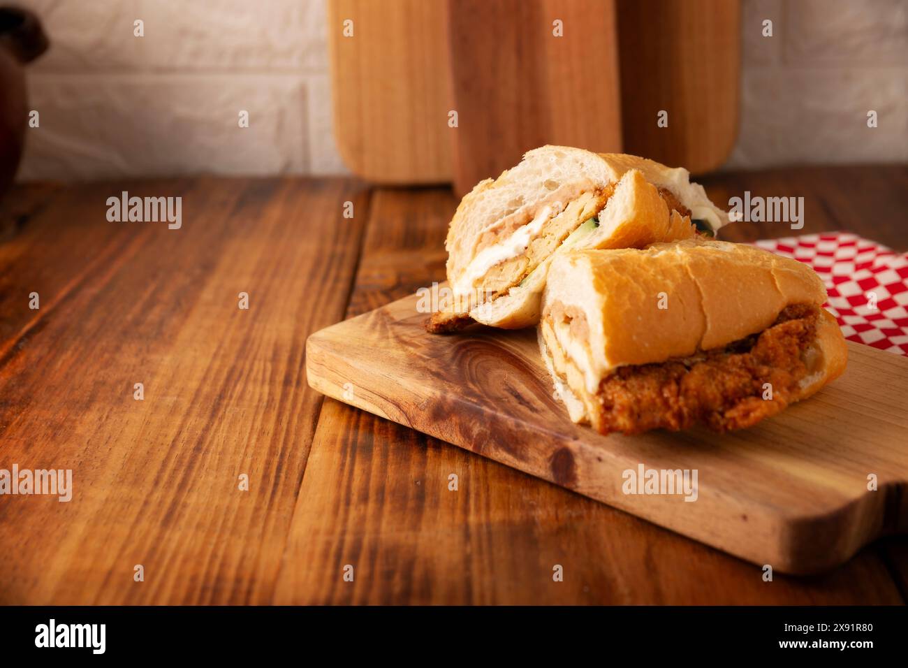 Mexican Torta de Milanesa. Sandwich made with bolillo bread, telera or ...