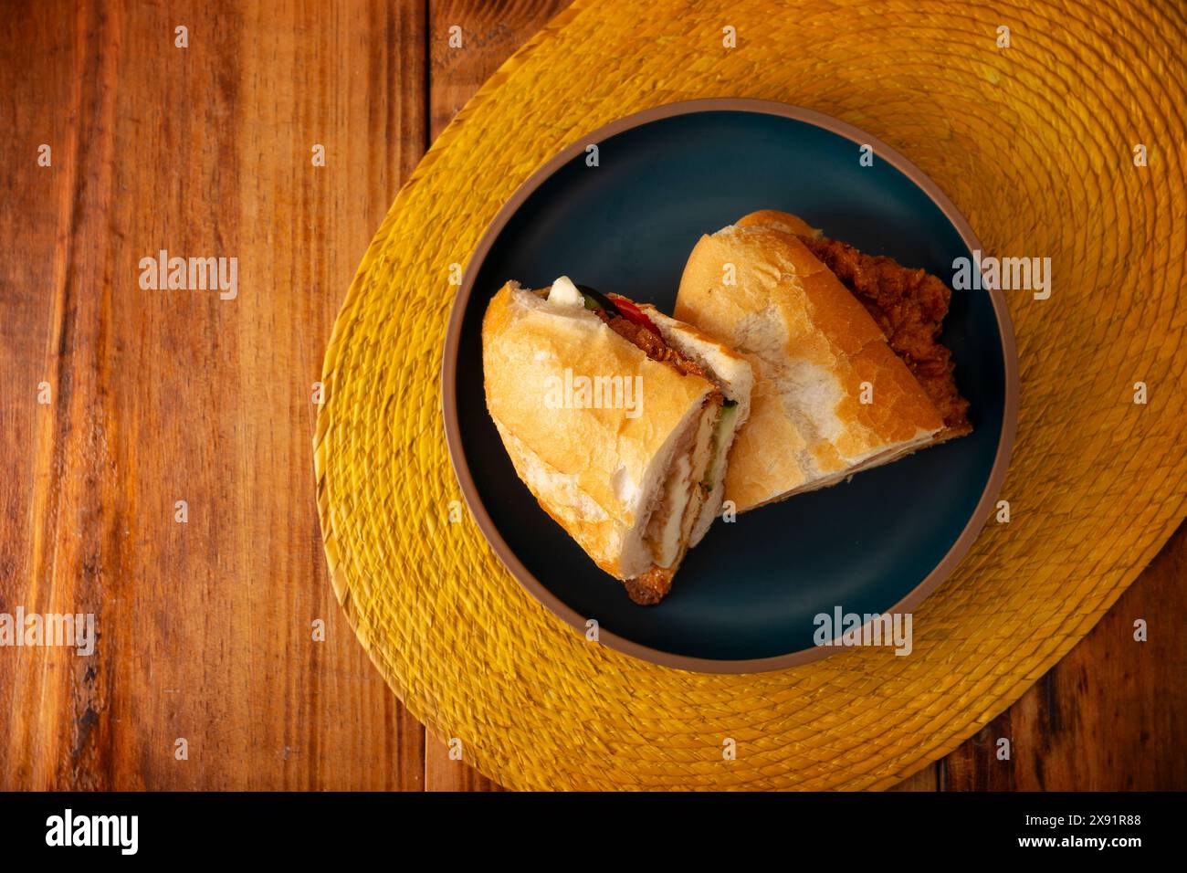 Mexican Torta de Milanesa. Sandwich made with bolillo bread, telera or ...