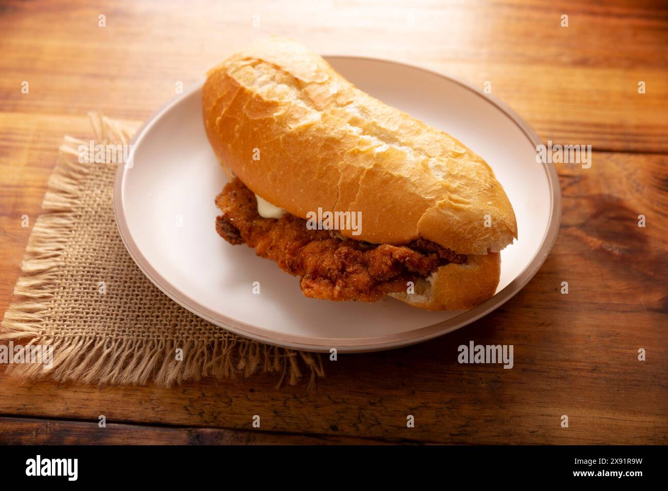 Mexican Torta de Milanesa. Sandwich made with bolillo bread, telera or ...