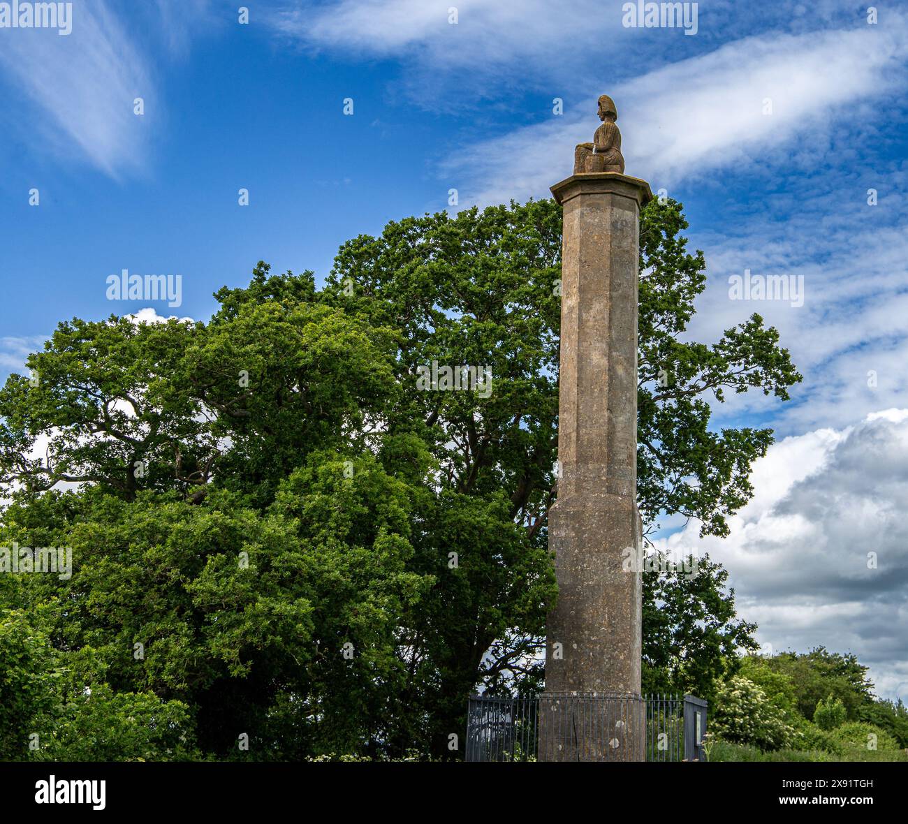 Monument statue on a tall column commemorating Maud Heath who left ...