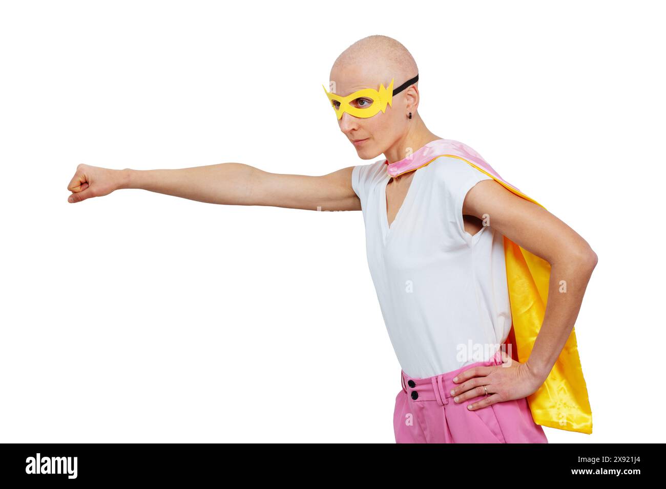 Strong girl ill of cancer strikes a pose in superhero costume Stock ...