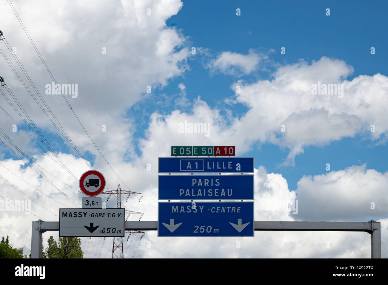 Driving in summer on highway and road signs direction to Paris and ...