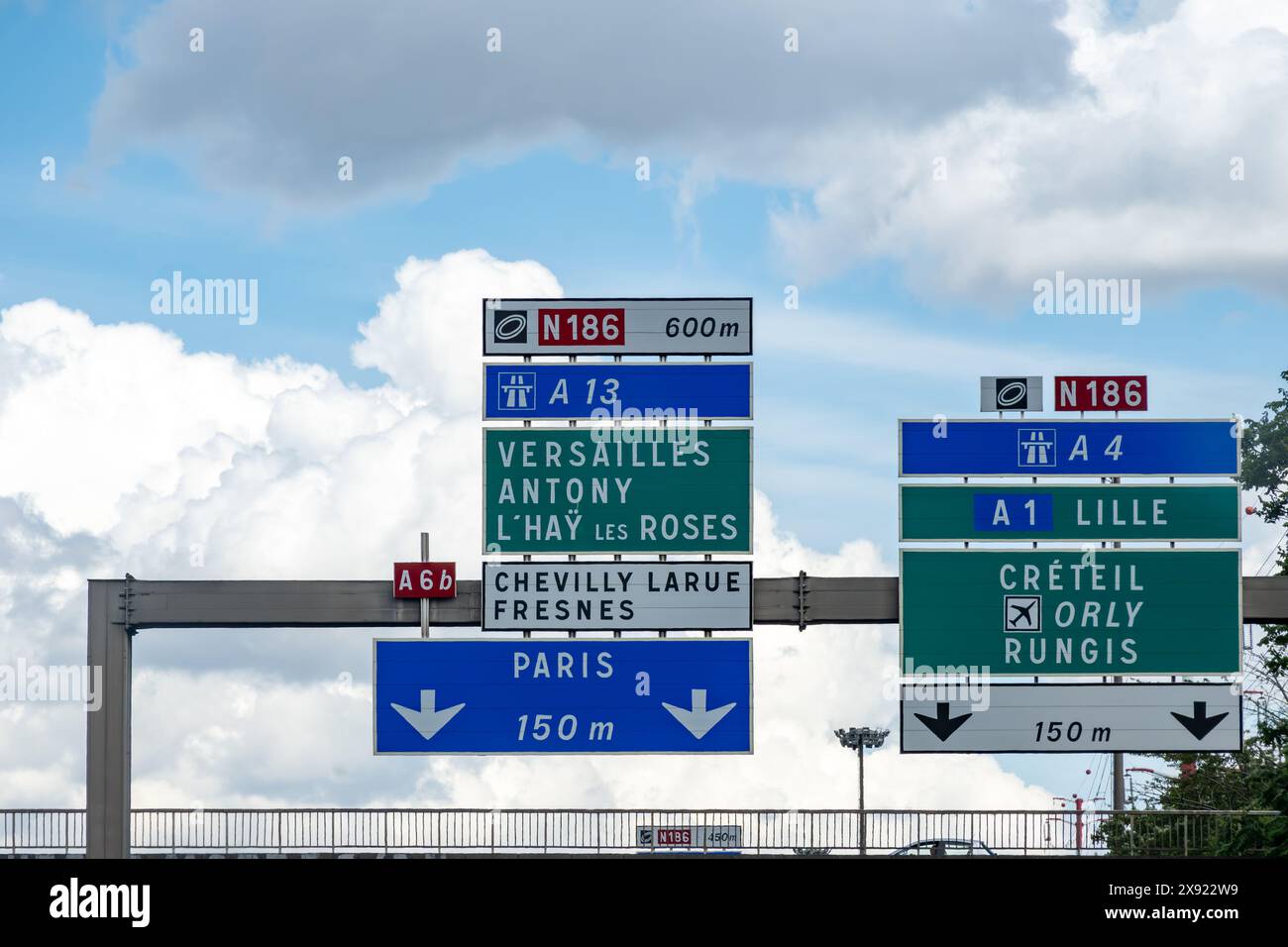 Driving in summer on highway and road signs direction to Paris and ...