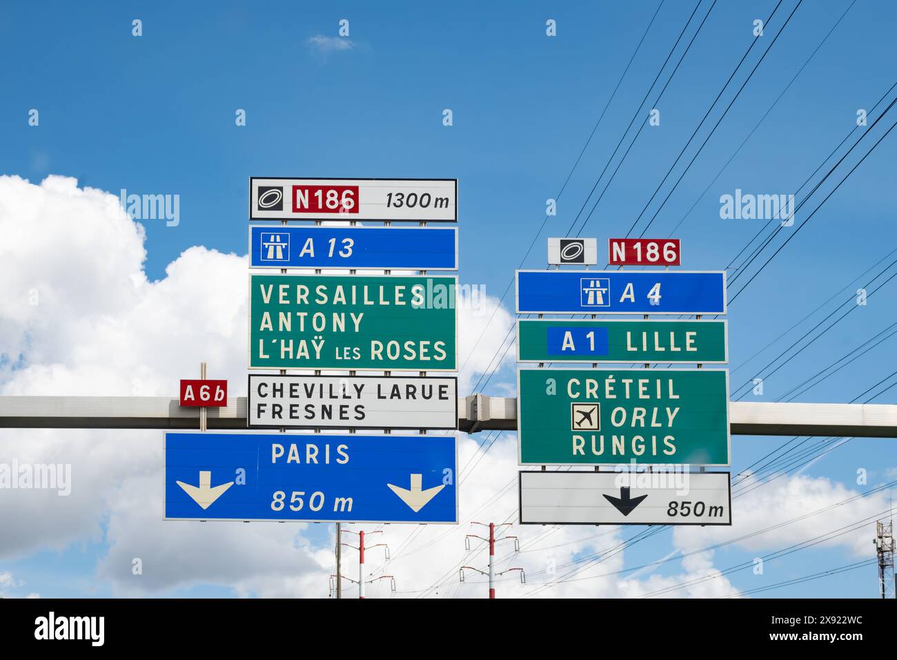 Driving in summer on highway and road signs direction to Paris and ...