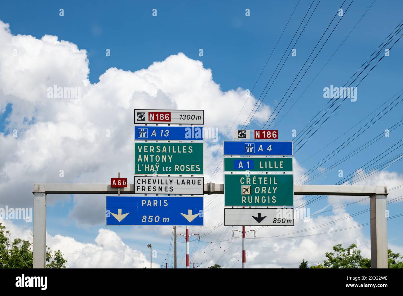Driving in summer on highway and road signs direction to Paris and ...
