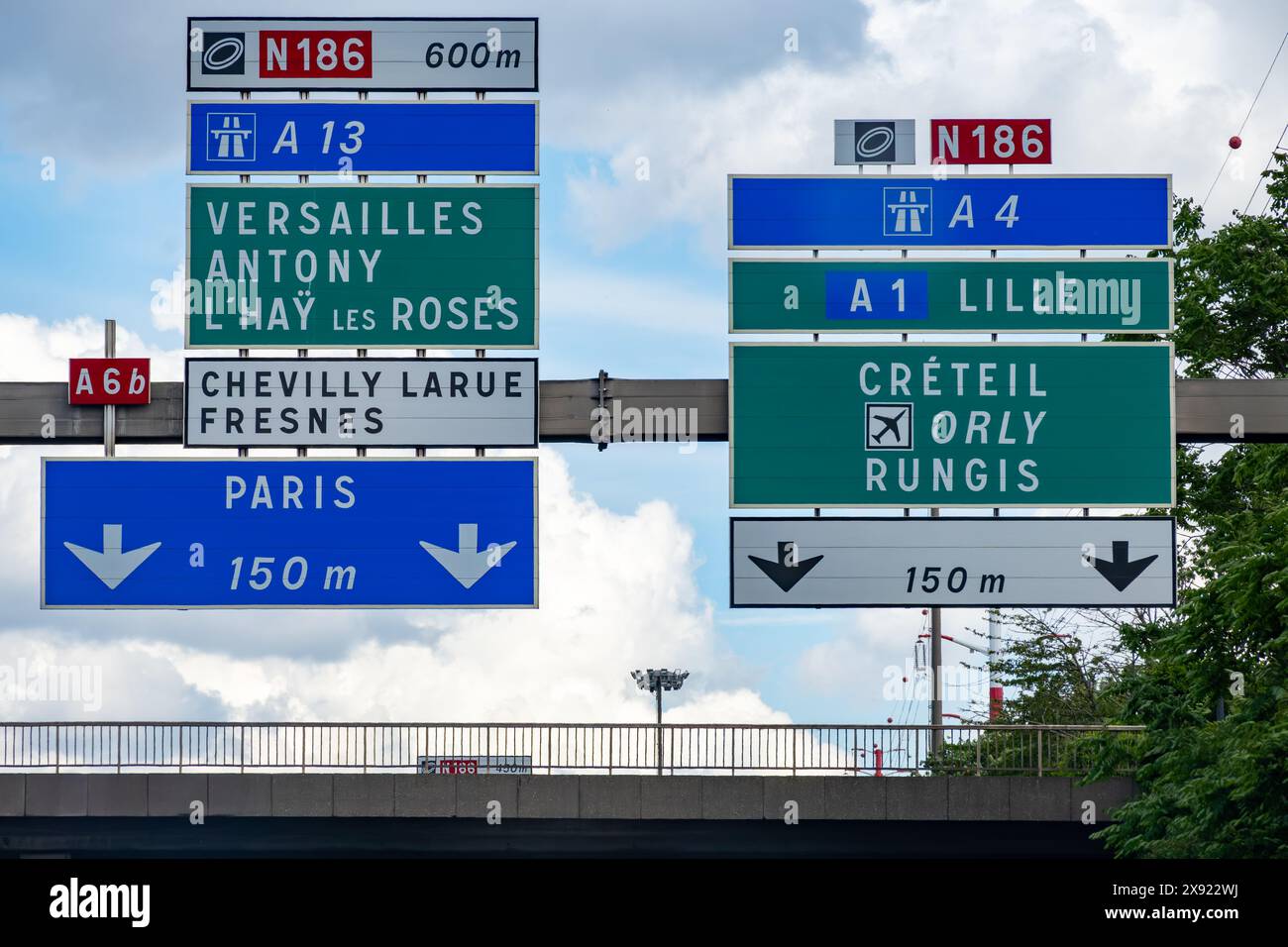 Driving in summer on highway and road signs direction to Paris and ...