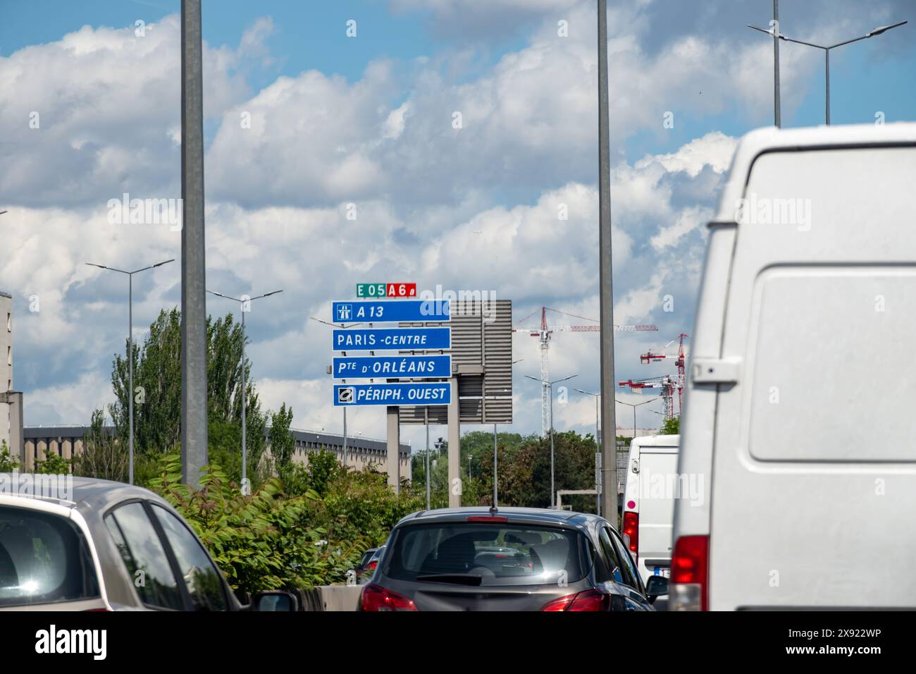 Highway road signs Paris, driving in heavy summer traffic on ring road ...