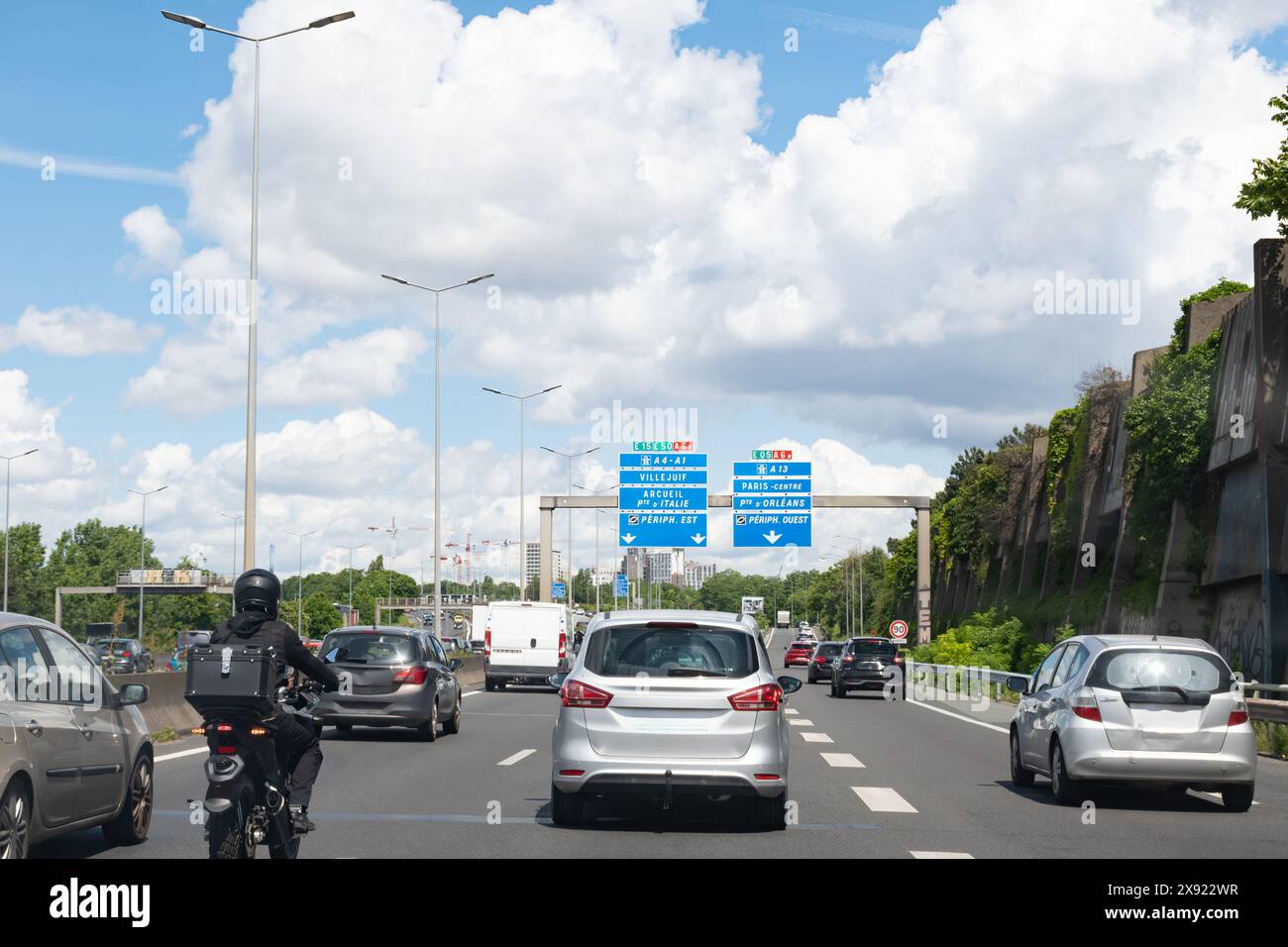 Highway road signs Paris, driving in heavy summer traffic on ring road ...