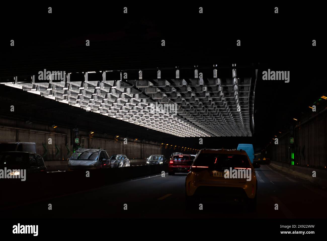 Driving in heavy summer traffic on ring road of capital of France ...