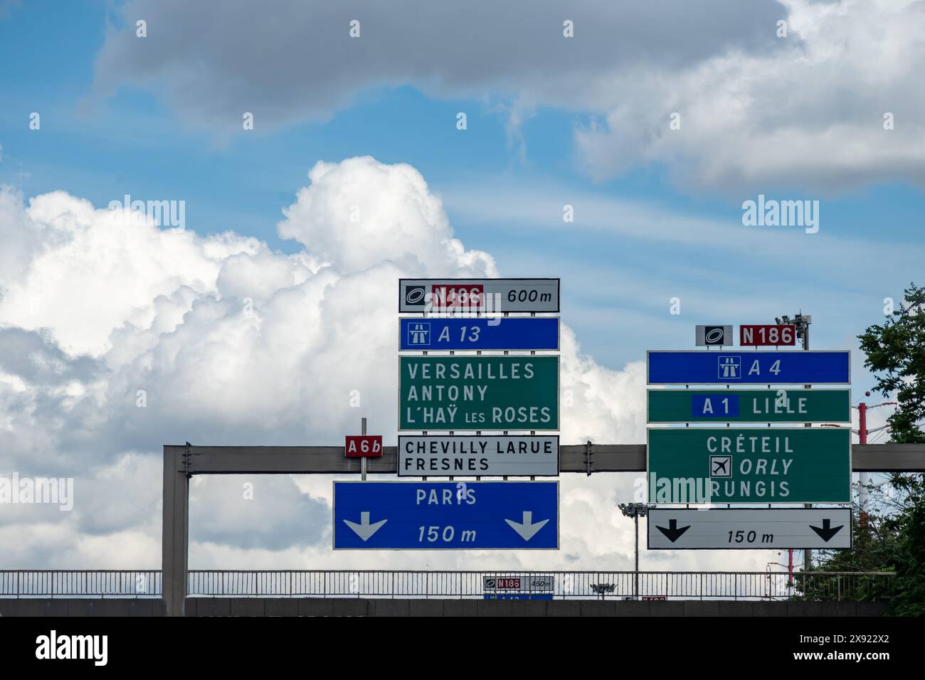Driving in summer on highway and road signs direction to Paris and ...