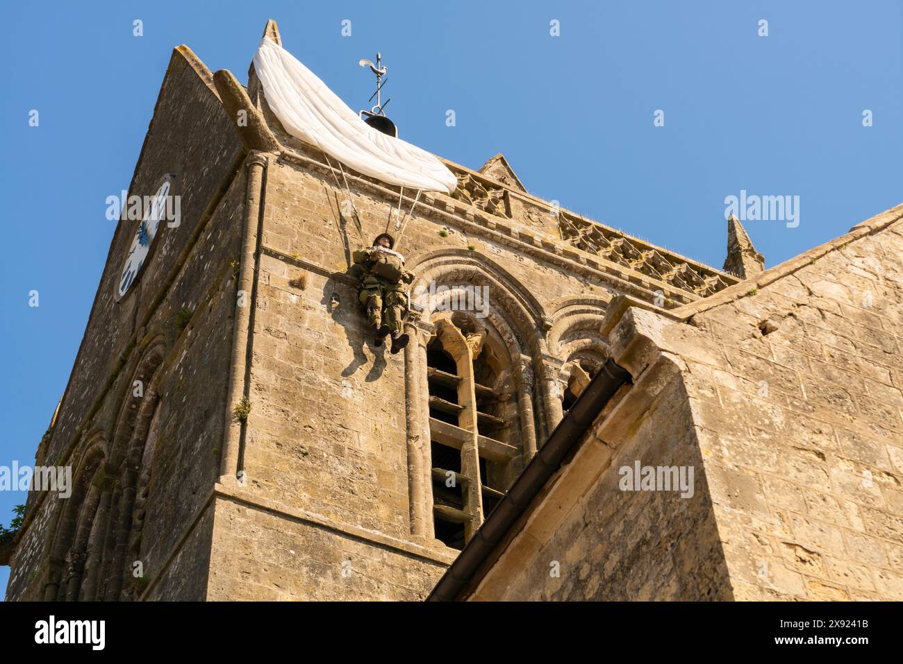 Replica of John Steele, American Paratrooper on the church steeple in ...