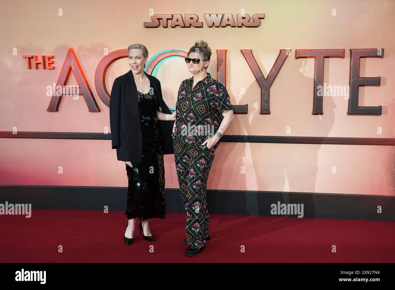 Rebecca Henderson, left, and Leslye Headland pose with photographers at ...