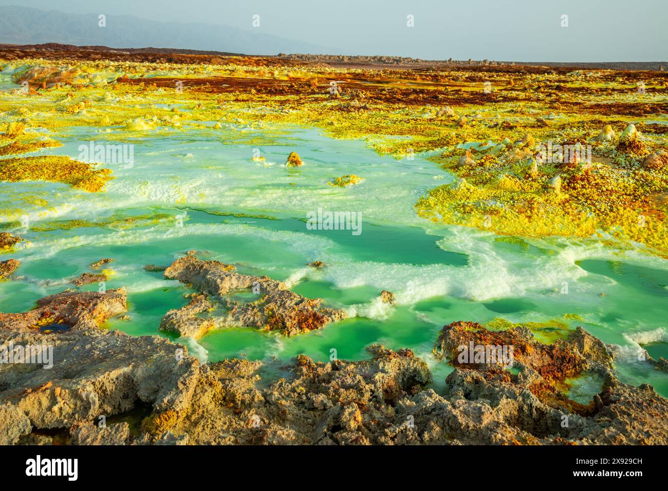 Colorful volcanic landscape with toxic lakes and sulphur minerals ...