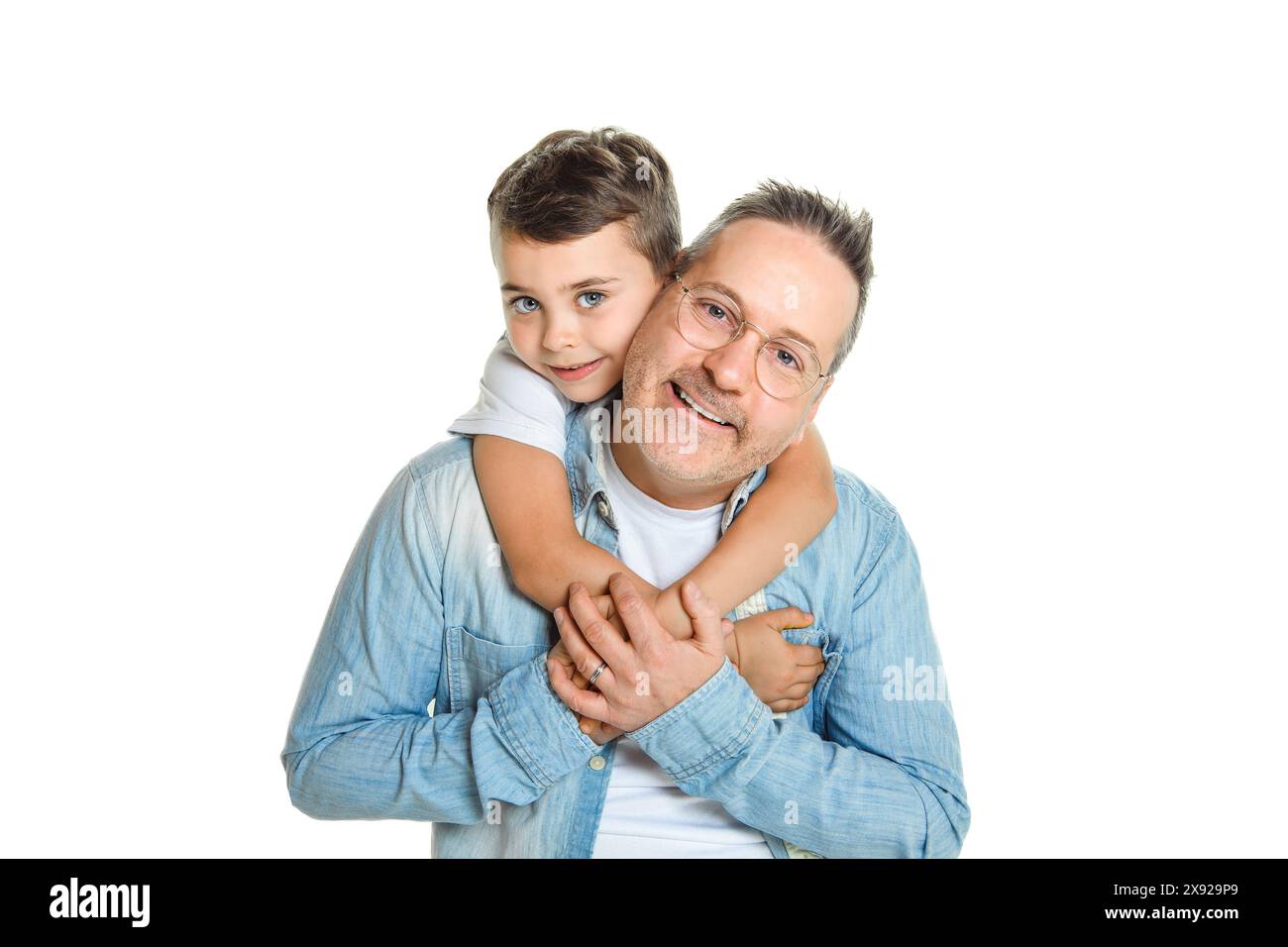Happy men with adopted child on white background Stock Photo - Alamy