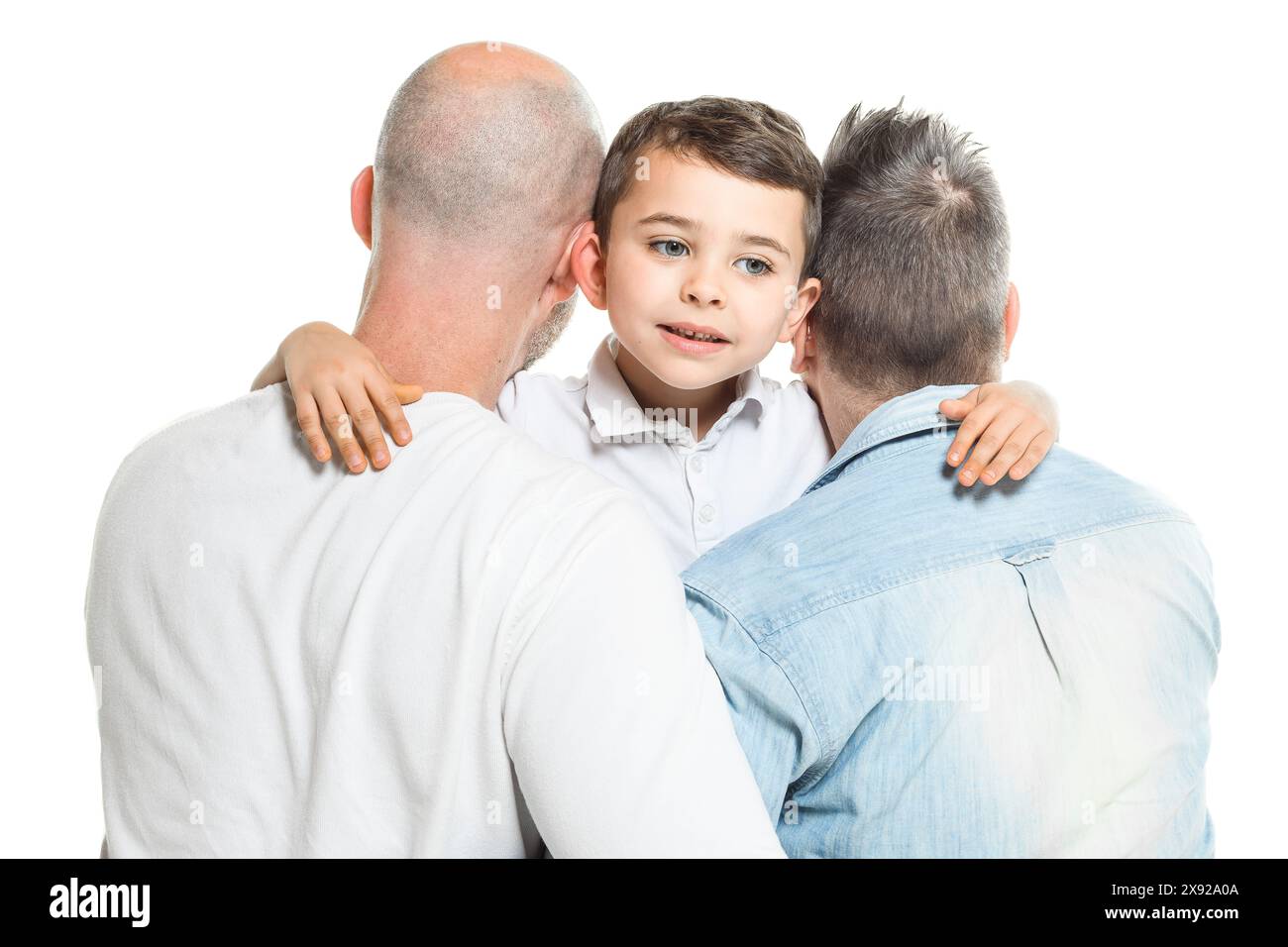 Two man couple with adopted child on white background Stock Photo - Alamy