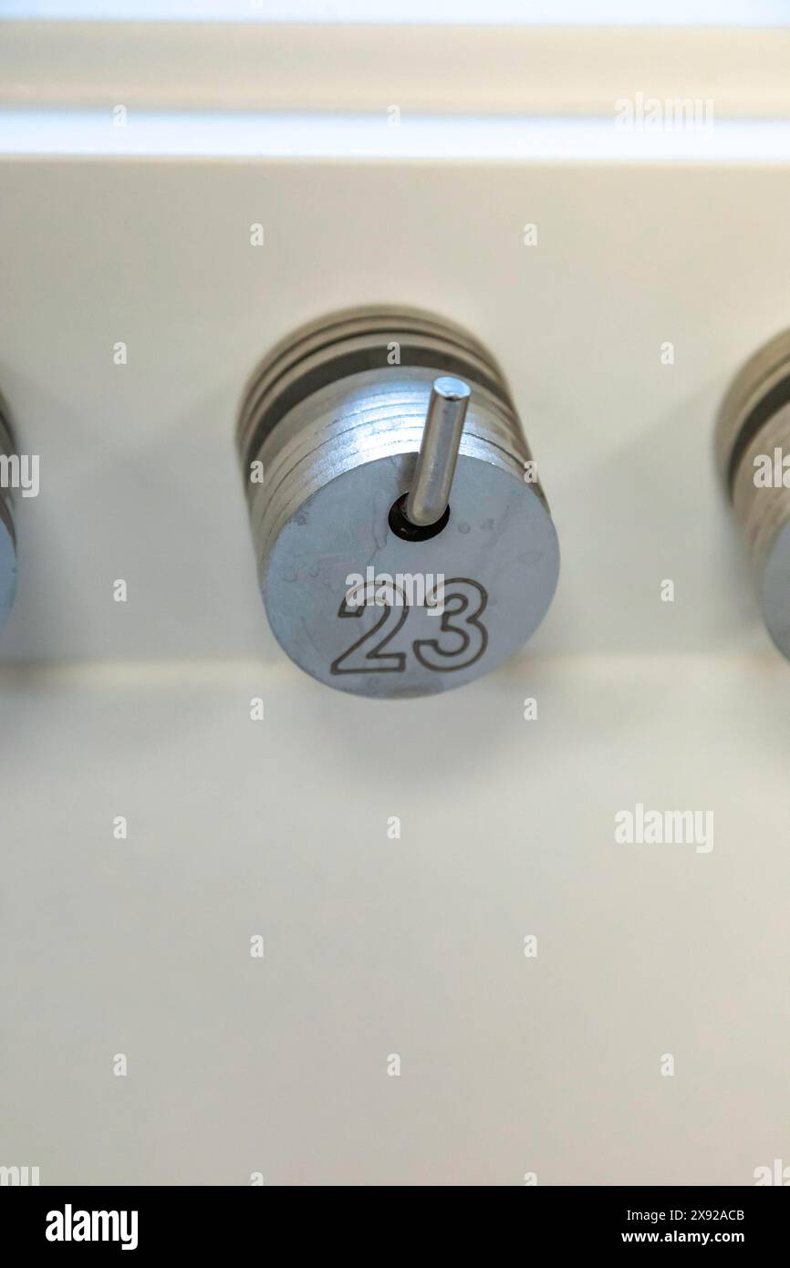 Identification tokens in the tray in the washing room before ...