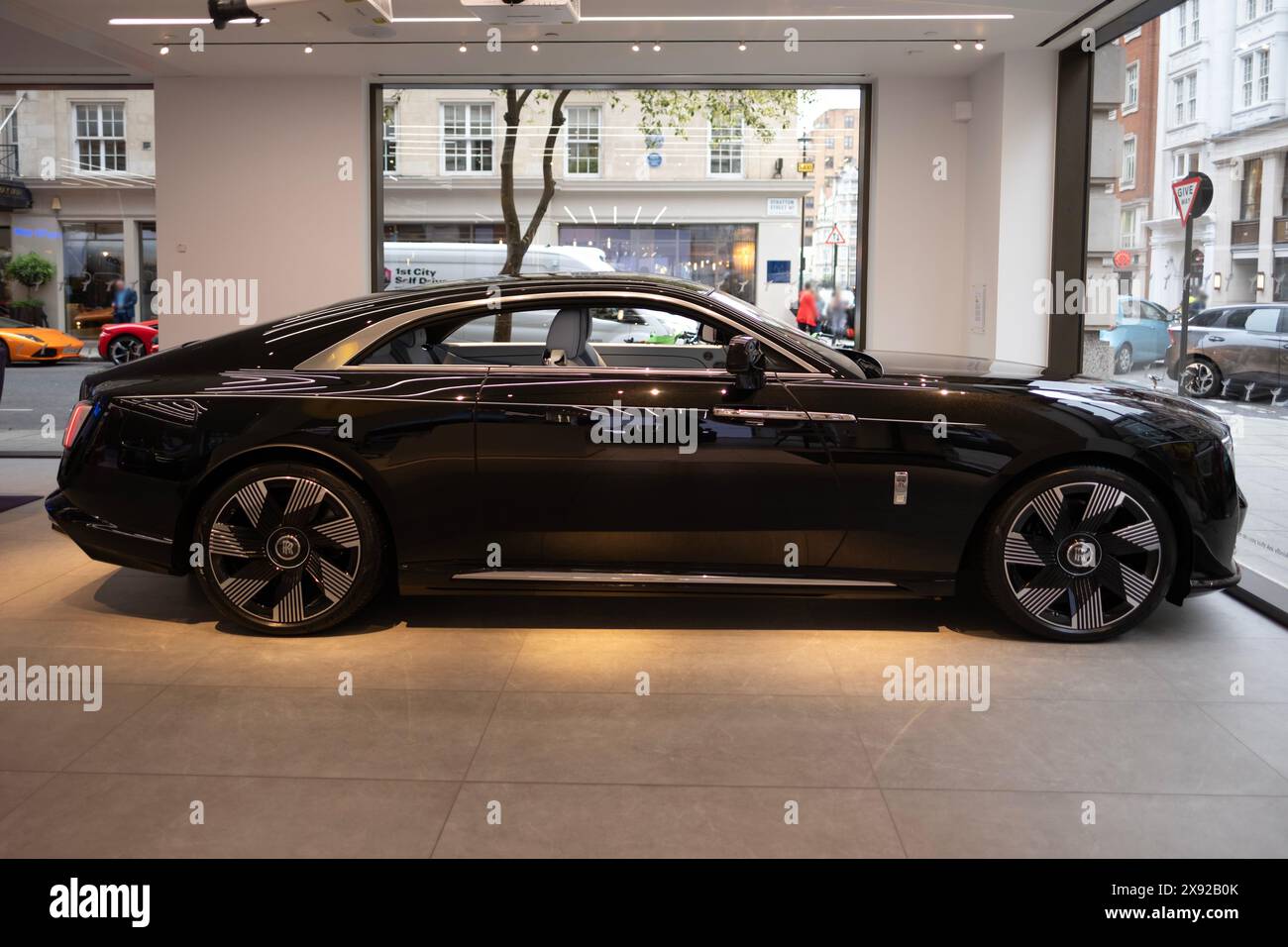 British black luxury limousine Rolls-Royce Phantom VIII with four-wheel ...