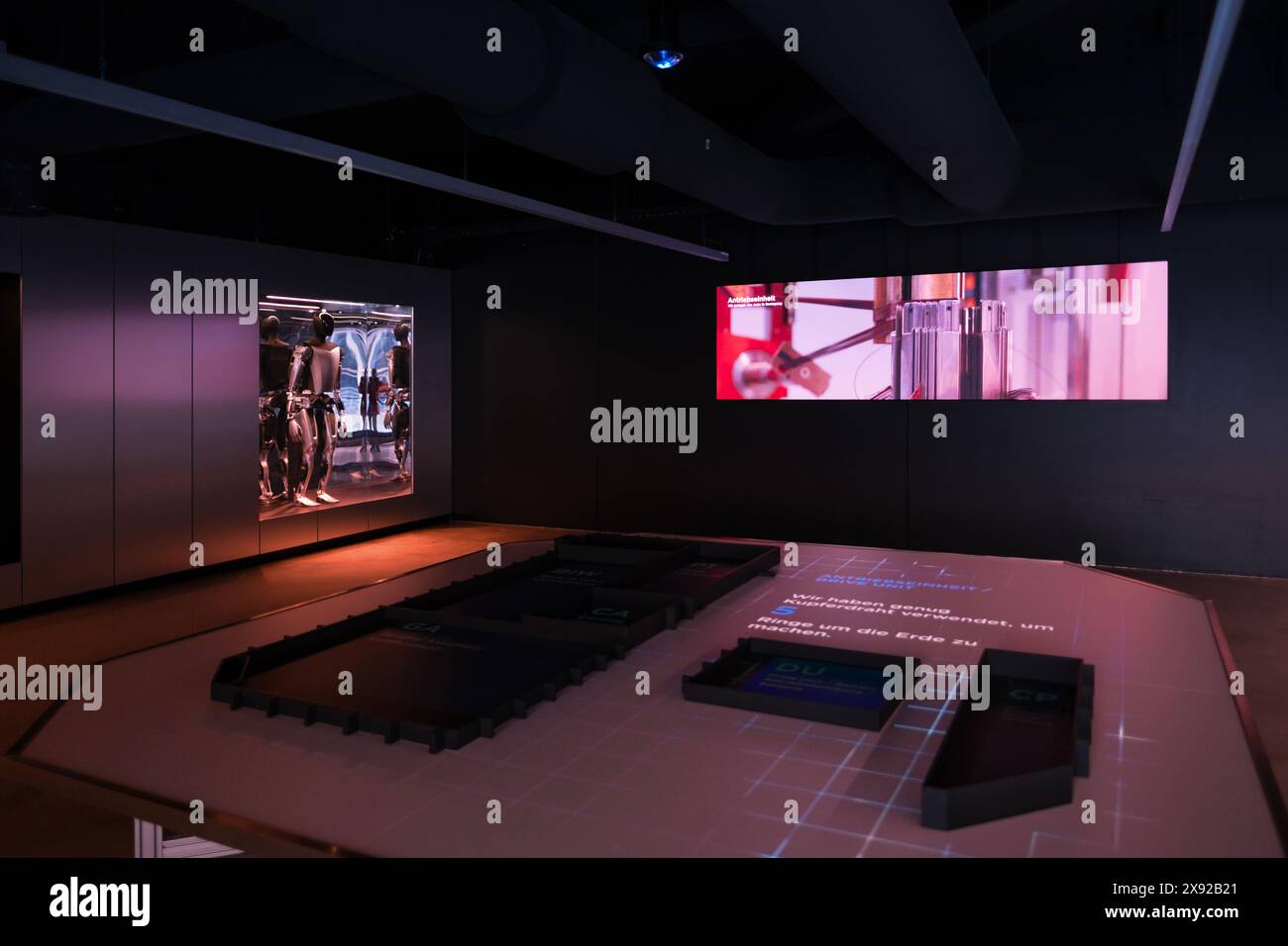 Tesla Bot Optimus robotic humanoid in Tesla's Giga Berlin lobby, large ...