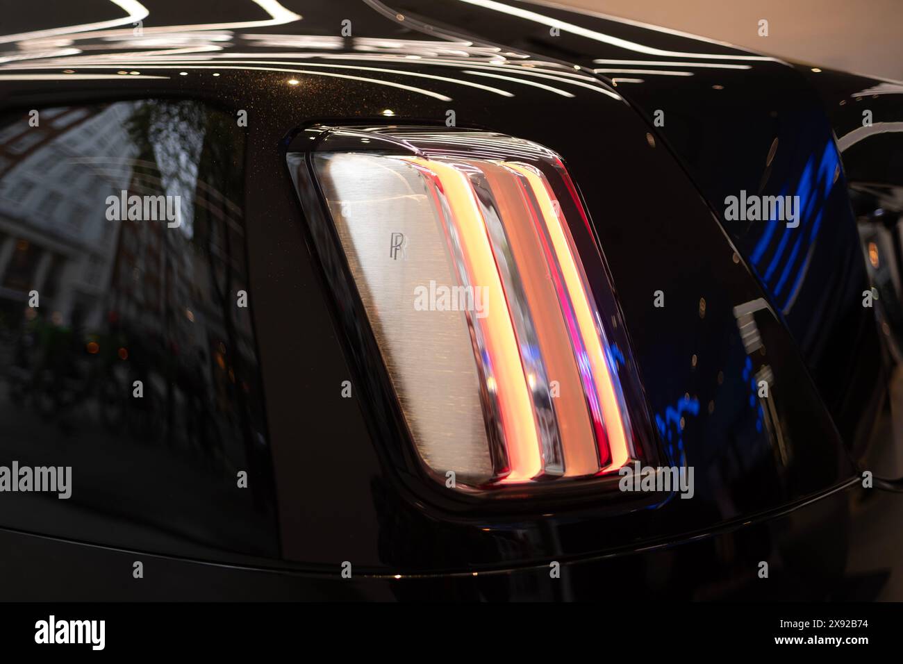 part of rear British black luxury limousine Rolls-Royce Phantom VIII ...