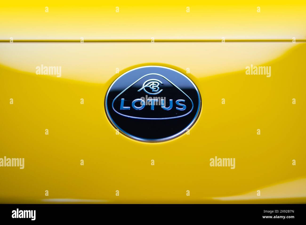 advertising logo yellow Electric Hyper-GT Lotus Emeya in showroom ...