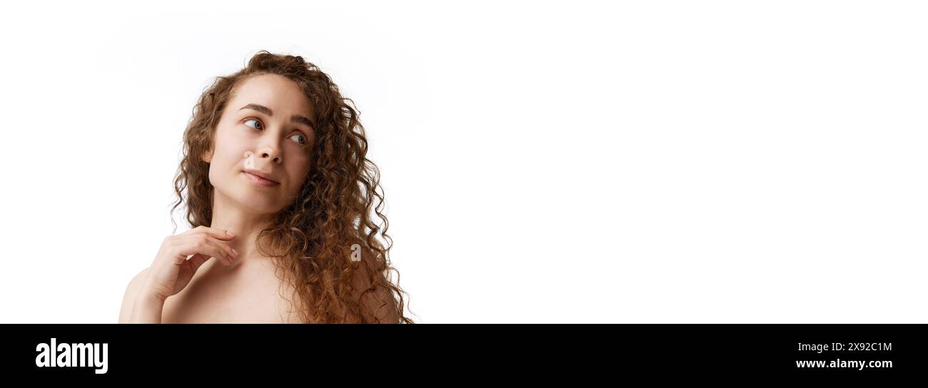 Beautiful young woman with perfect well-kept skin and natural curly ...