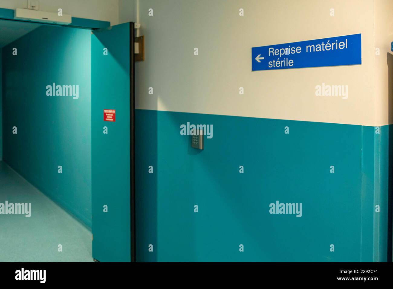 Corridor in the sterilization area with sterile equipment return sign ...