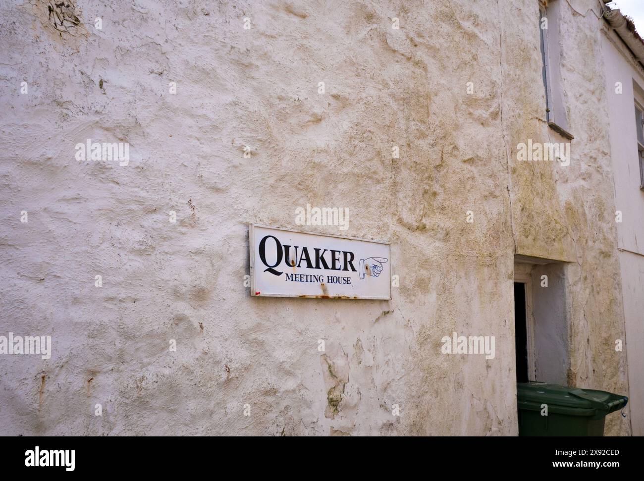 Sign pointing to the Quaker Meeting House in Marazion, Cornwall. The ...