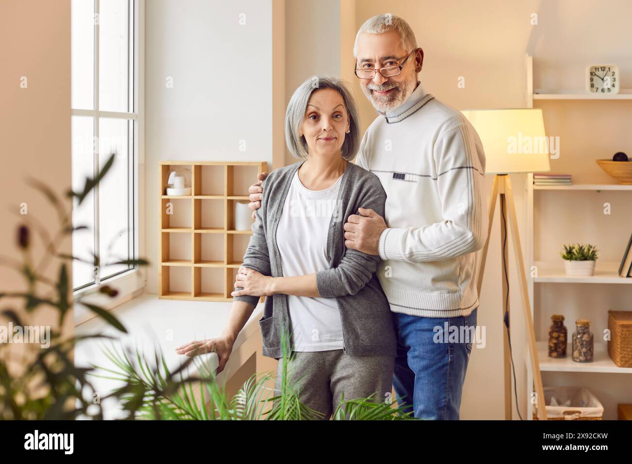 Senior couple, happy old people, grey haired elderly pair family home ...