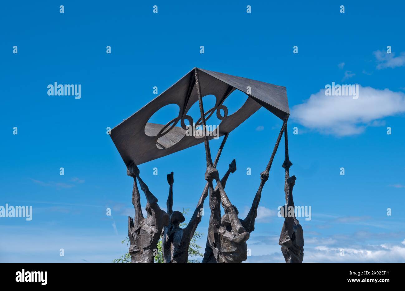 Lausanne, Switzerland - may 28, 2024 - Sculpture of people holding Five ...