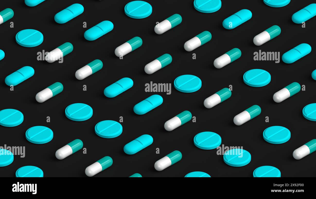 Many white turquoise capsules, tablets and pills on black background ...