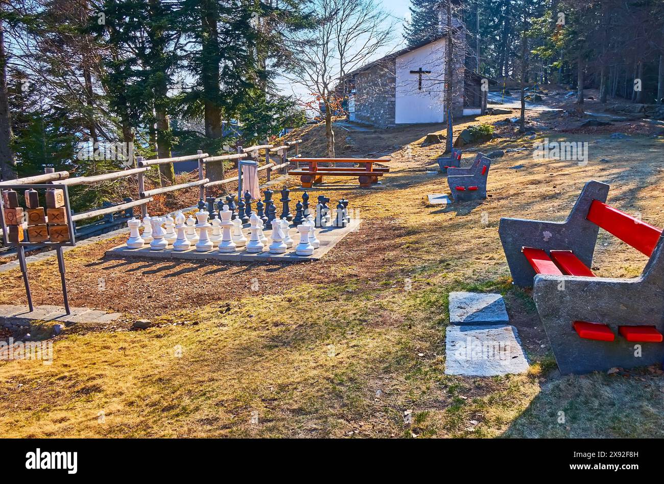 The giant chessboard in front of the old stone Capella, located in area ...