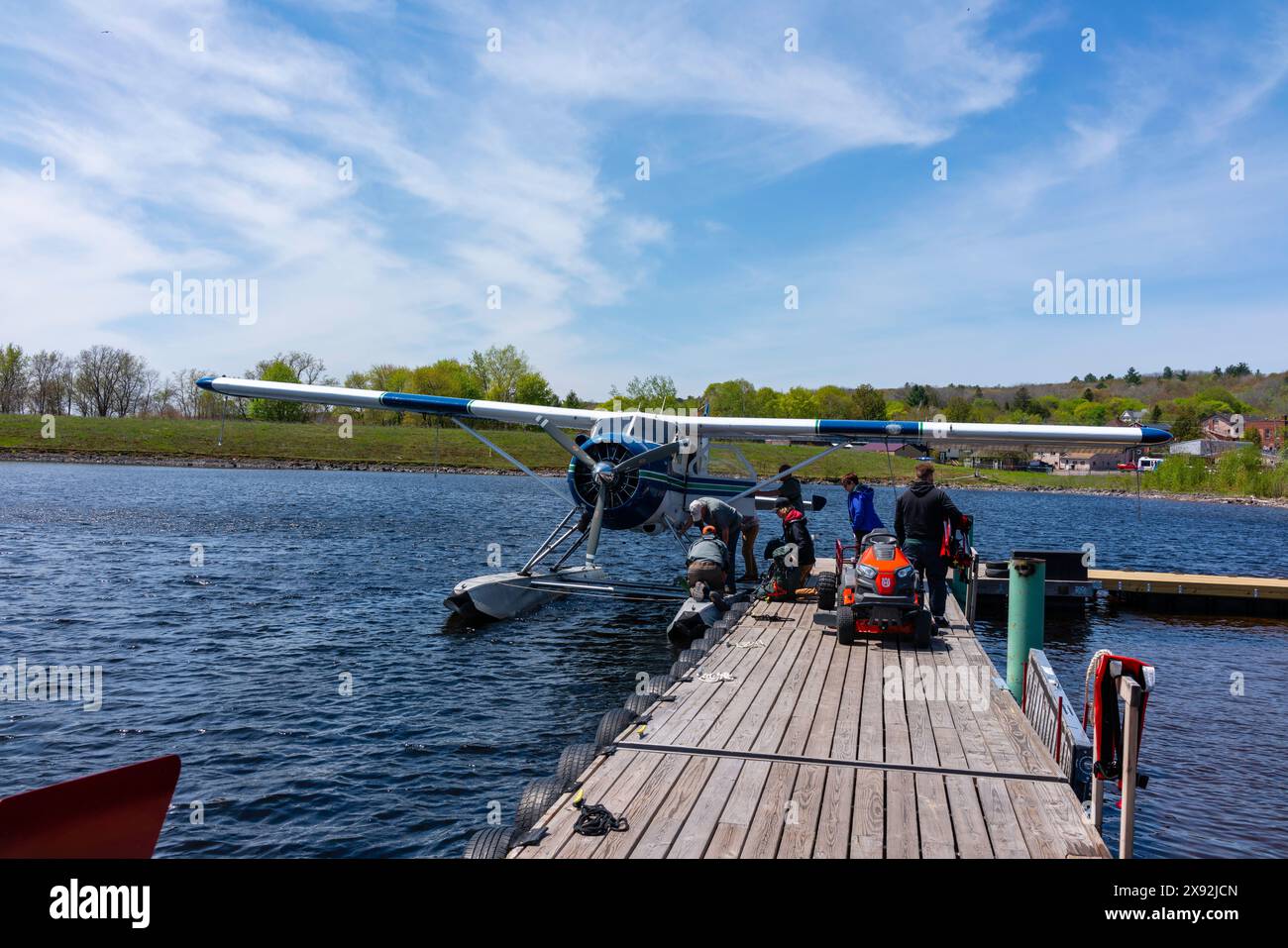 Pilots and staff load gear onto seaplanes for flights to Isle Royale ...