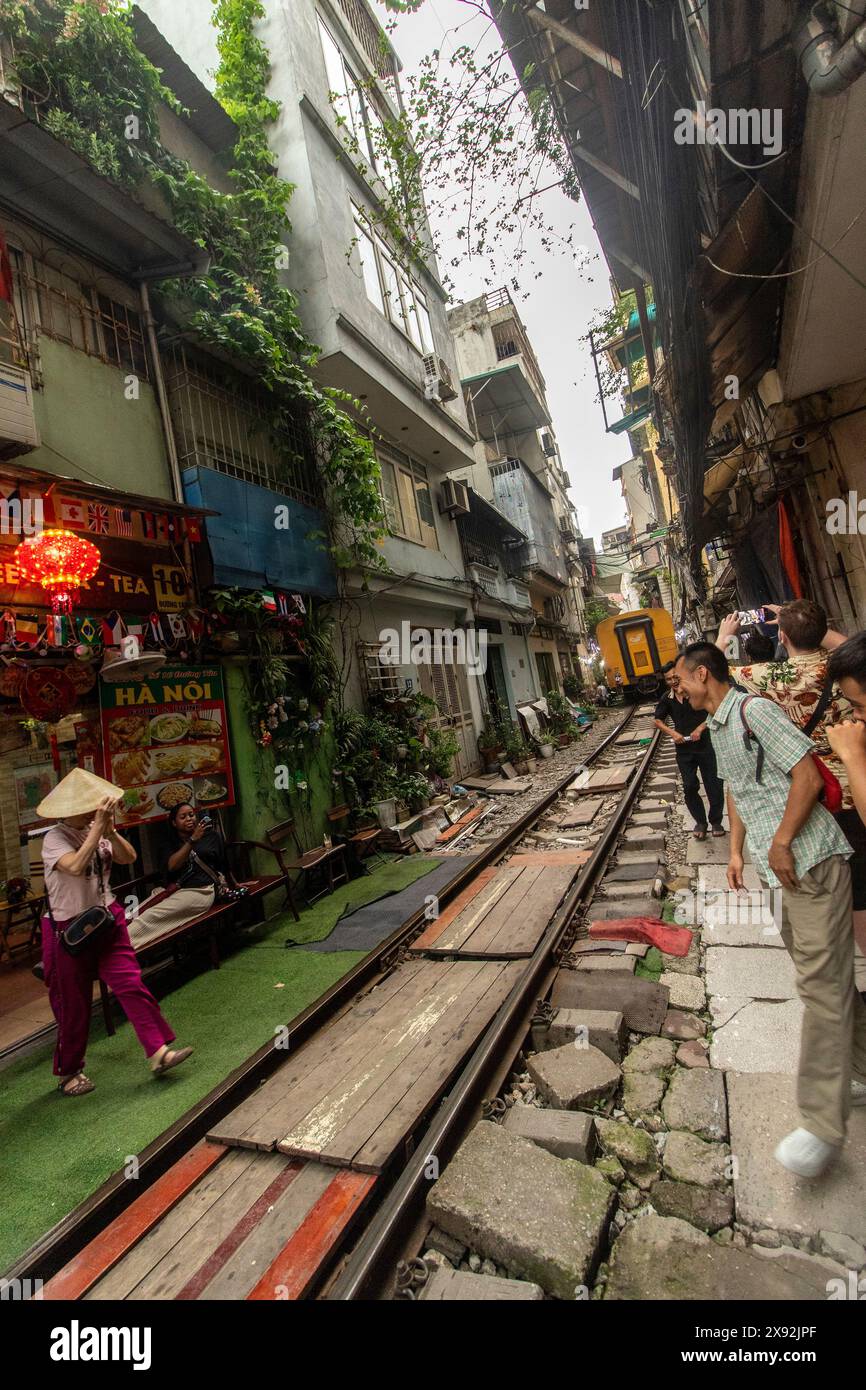 Exciting and bucket list must see tourist Mecca view along the unique Hanoi Train Street ...