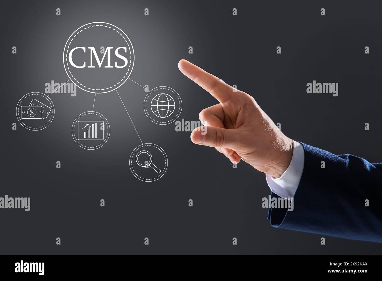 CMS. Man using virtual screen, closeup. Scheme with icons on dark ...