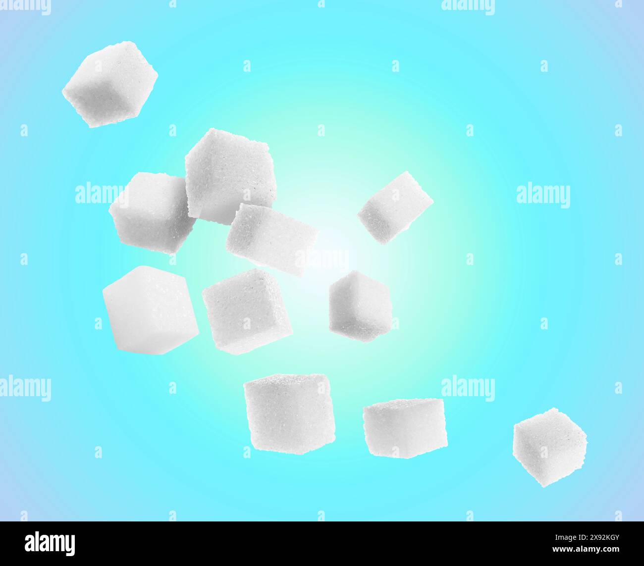 Refined sugar cubes in air on light blue gradient background Stock ...