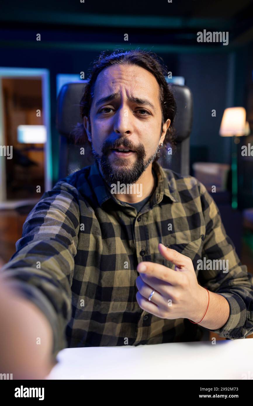 Male individual interacts mobile app hi-res stock photography and ...