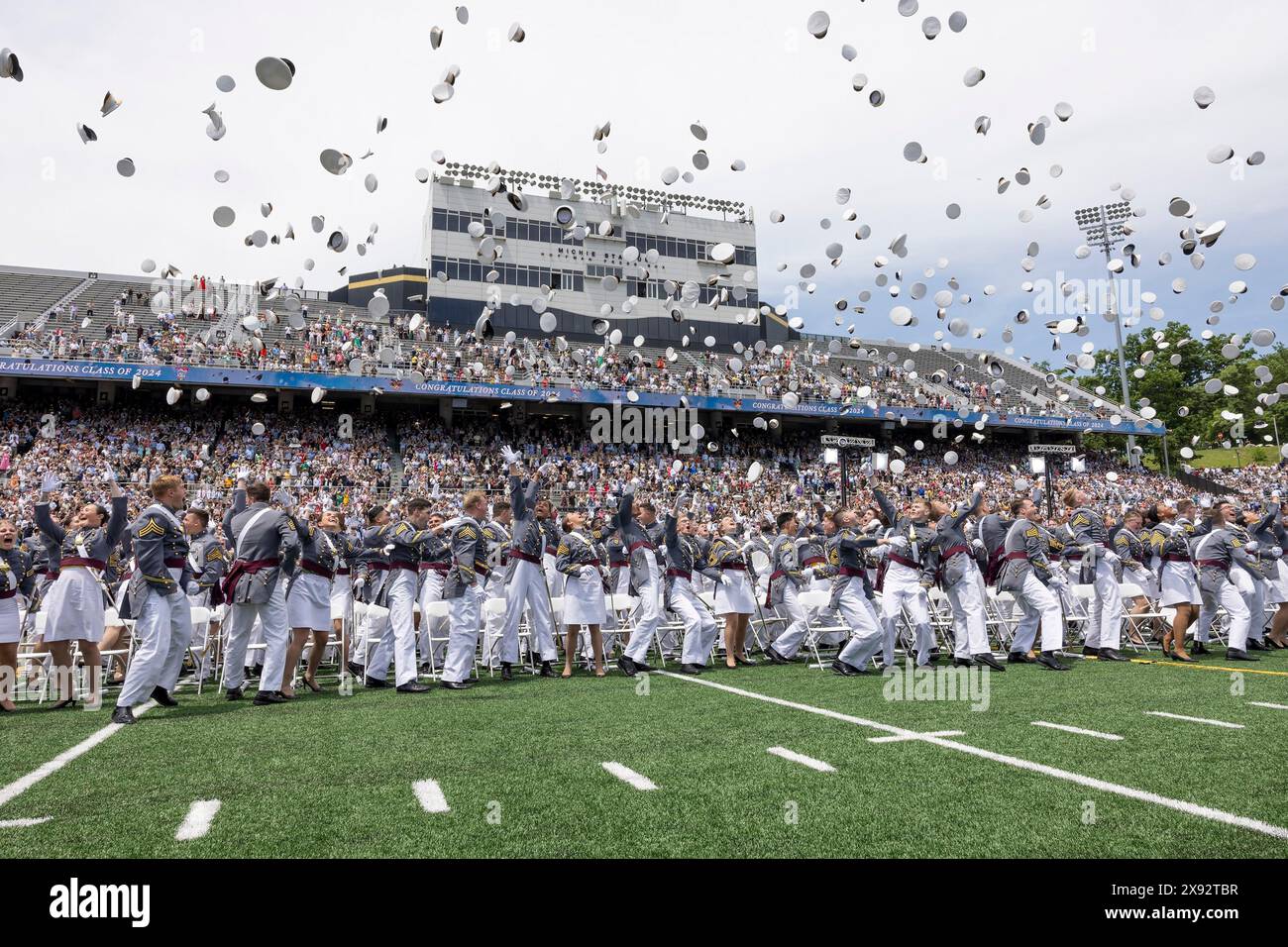Tossed into the air by students hi-res stock photography and images - Alamy