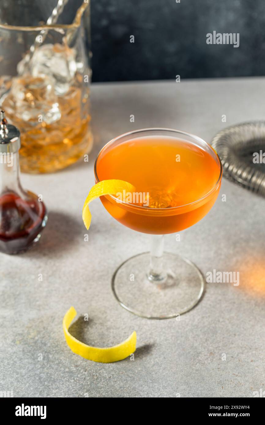 Cold Boozy Pink Gin Cocktail with Bitters Stock Photo - Alamy