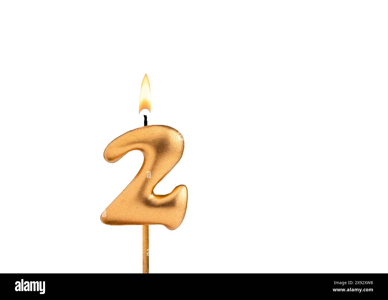 Birthday number 2 - Golden candle on white background Stock Photo - Alamy